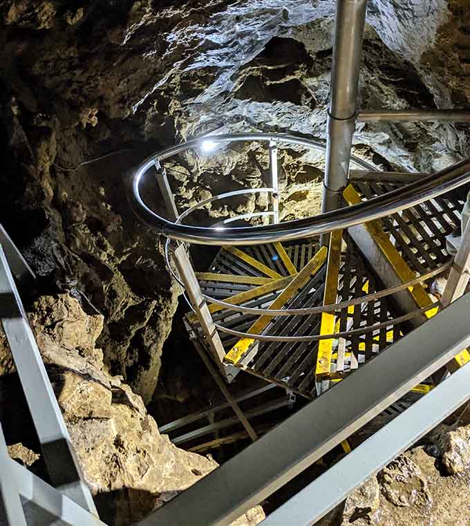 These spiral stairs descend deep into the earth, taking you on a vertical journey through geological time itself.