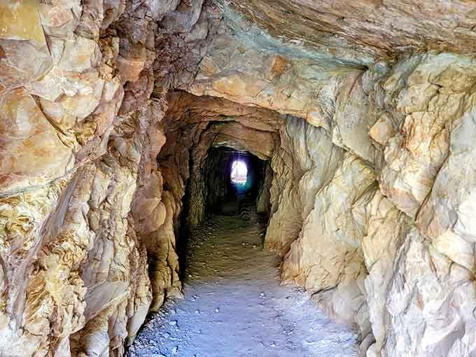 Mine tunnels that once echoed with pickaxes now welcome curious visitors seeking cool refuge and history lessons.