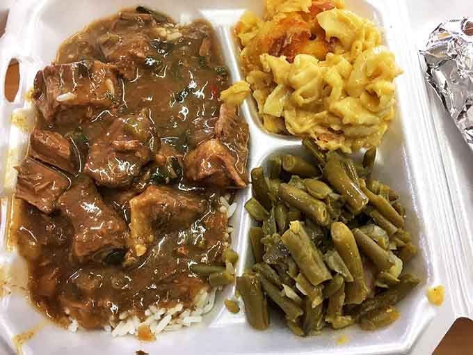 Tender beef swimming in rich gravy alongside mac and cheese that's clearly been made with actual cheese, not that powdered impostor stuff.