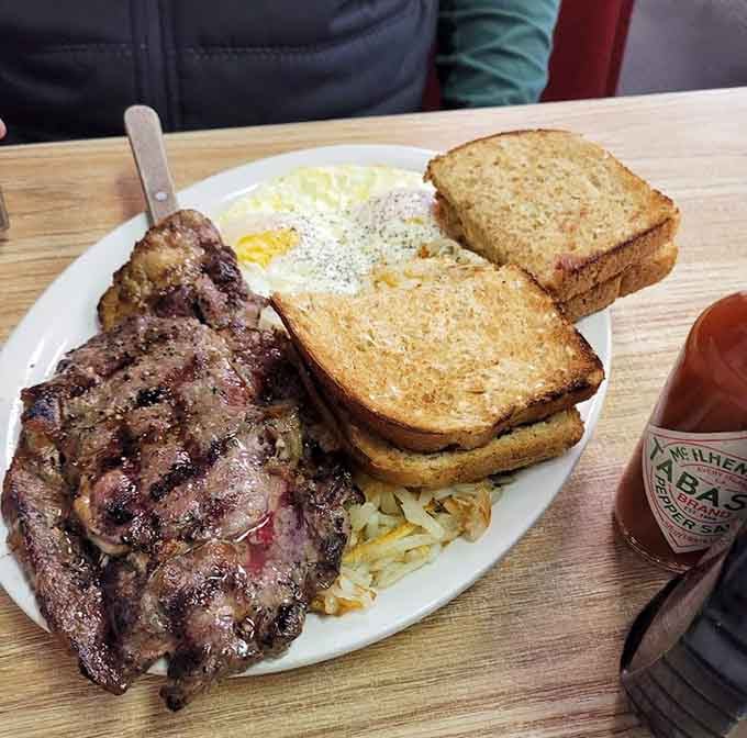 Steak and eggs with hash browns: breakfast of champions, or anyone who knows what's good.