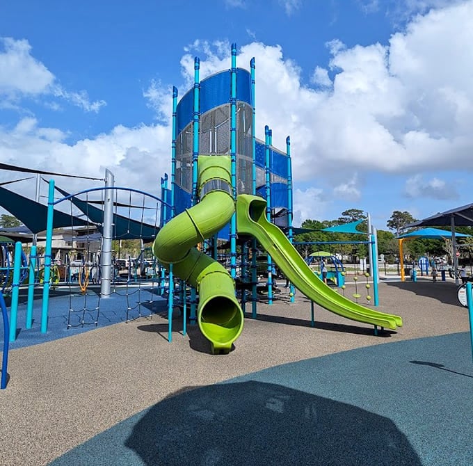 Bright green slides that practically glow with the promise of countless thrilling descents and joyful squeals.