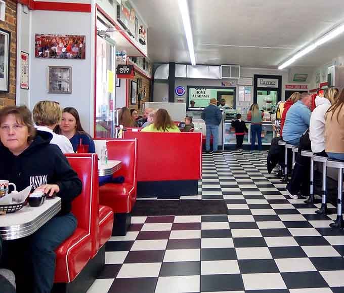 Real people enjoying real food in real booths, not actors pretending to eat for a commercial shoot.
