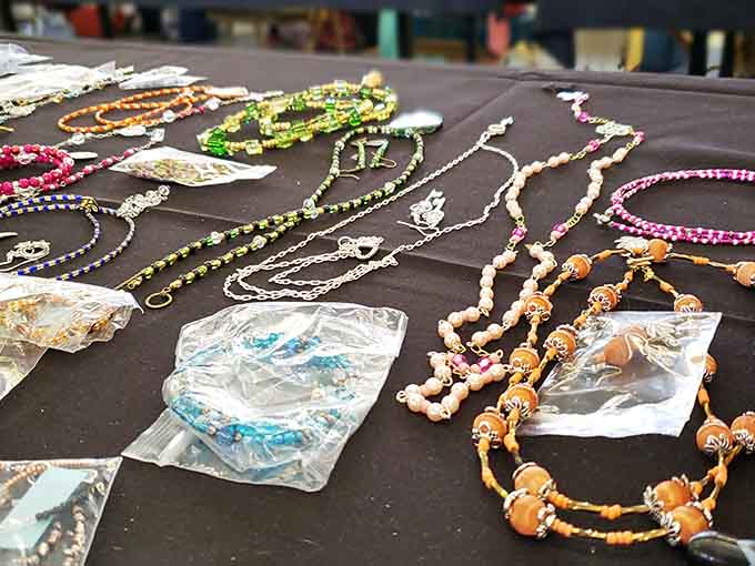 Beaded necklaces and costume jewelry waiting to add sparkle to someone's next adventure or outfit.