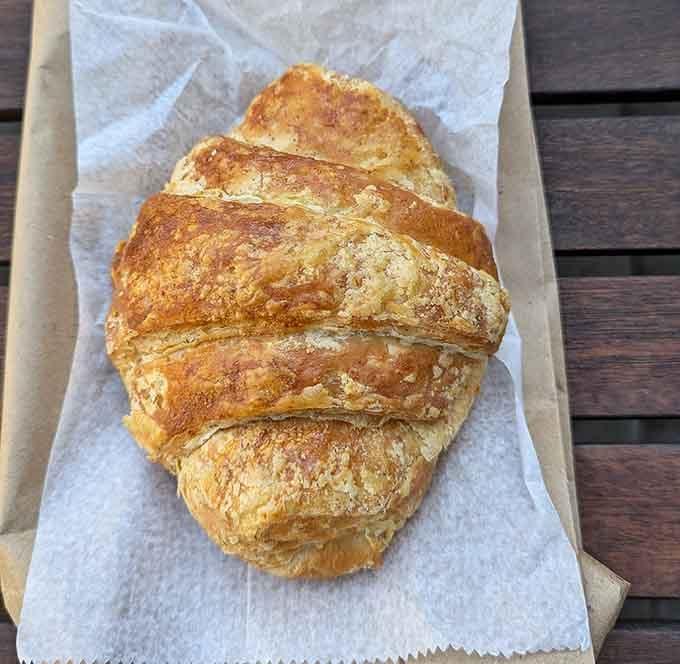 A proper croissant should shatter when you bite it, and this buttery beauty clearly got the memo.