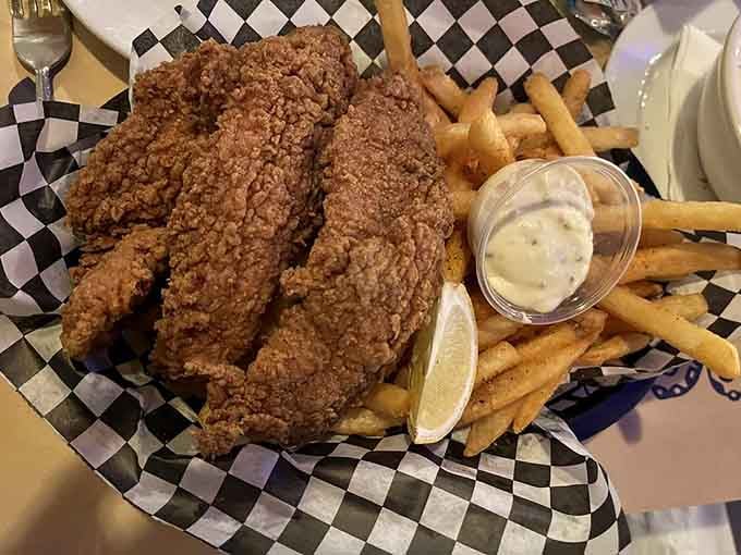 Those massive catfish fillets with crispy coating and fries could feed a small army or one very happy person.