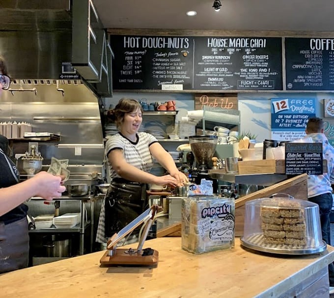 Behind every great doughnut is someone who knows exactly what they're doing, and this crew clearly has it figured out.