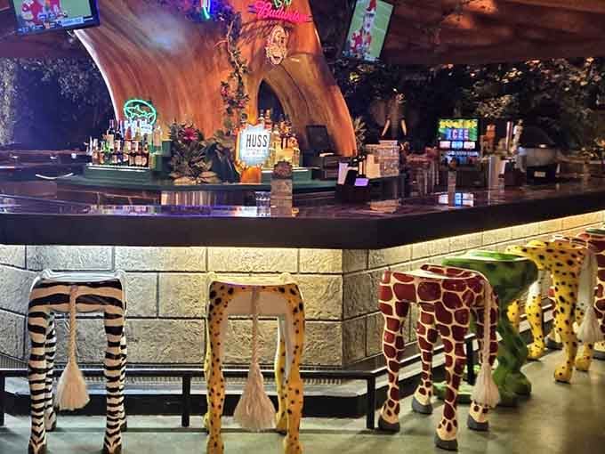 Bar seating with animal print stools where the adults can enjoy tropical drinks while gorillas watch overhead.