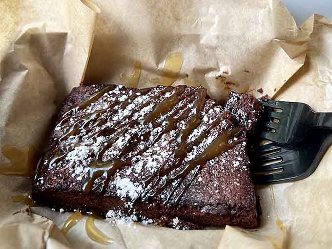 Brownies dusted with powdered sugar, the perfect sweet ending to your subterranean dining adventure in the Alabama wilderness.