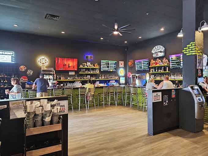 That brick-patterned bar backed by bottles promises grown-up refreshments for your inner child's gaming marathon.