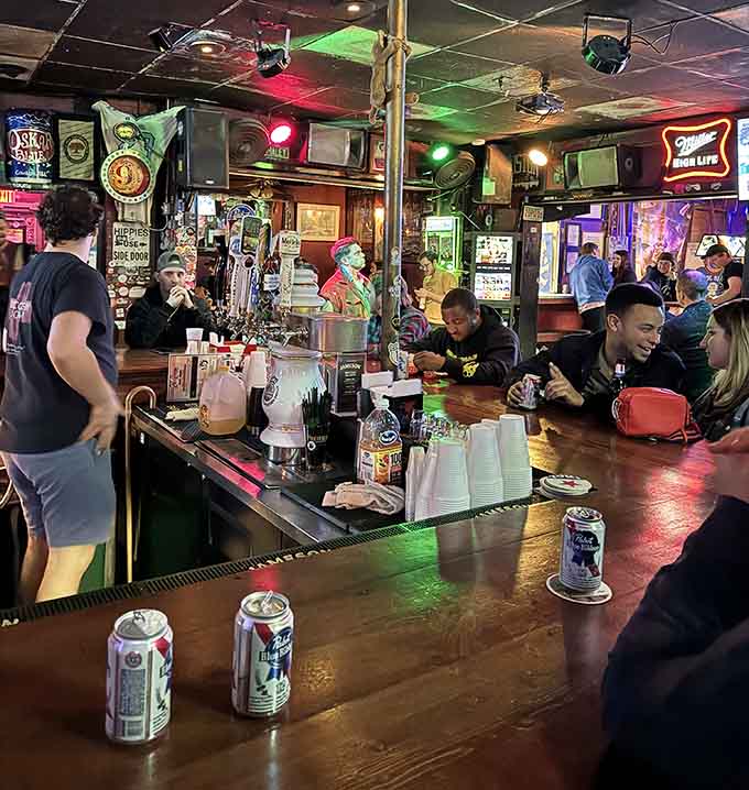 The bar buzzes with energy as strangers become friends over cold beers and shared appreciation for good times.