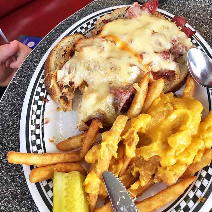 The open-faced sandwich that launched a thousand naps. Melted cheese cascading over meat with fries standing by for the inevitable cheese dip.
