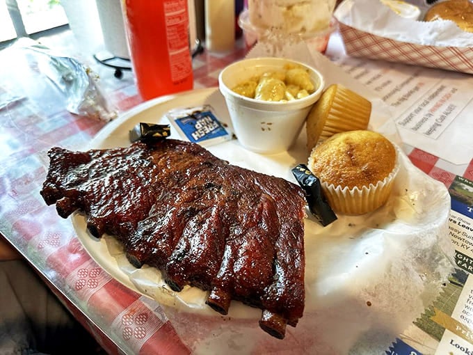 Ribs with a bark so perfect they should be in a barbecue museum. That cornbread muffin isn't just a side&mdash;it's essential equipment.