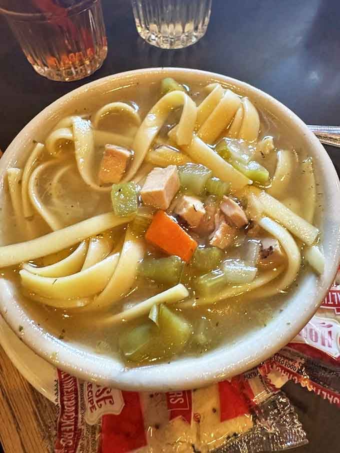 Homemade chicken noodle soup with noodles thick enough to stand up to your spoon. This isn't medicine; it's a bowl of pure comfort.