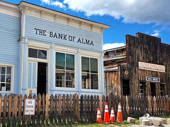 The Bank of Alma stands proud in white clapboard elegance, where fortunes were made and occasionally lost overnight.