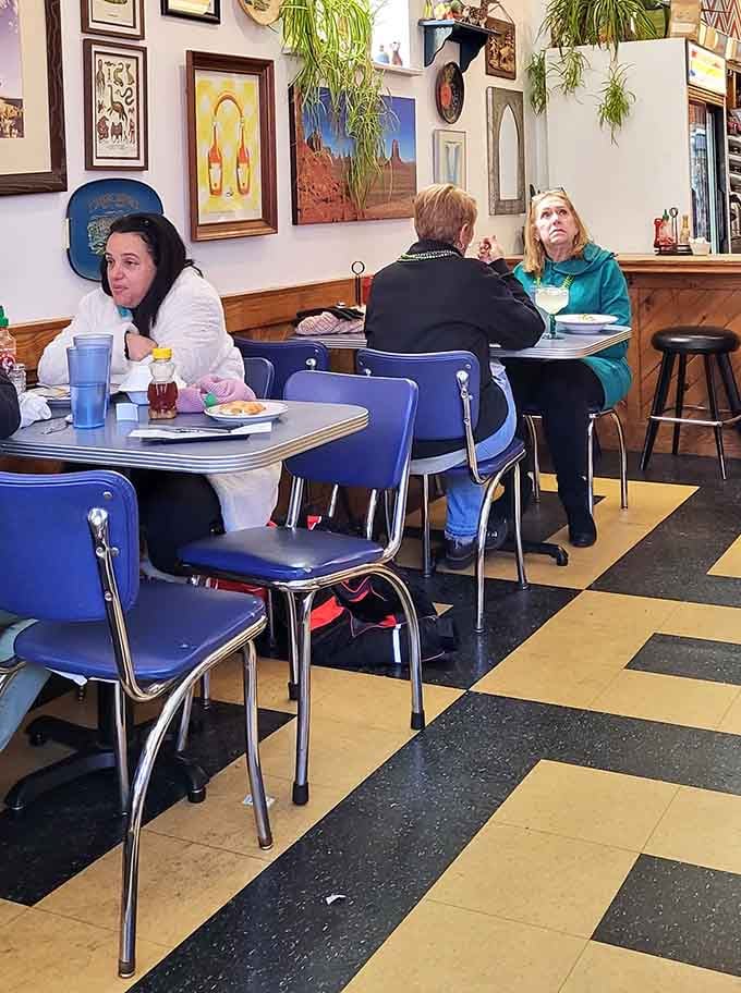 Real people enjoying real food in a real diner, which is becoming rarer than a polite internet comment.