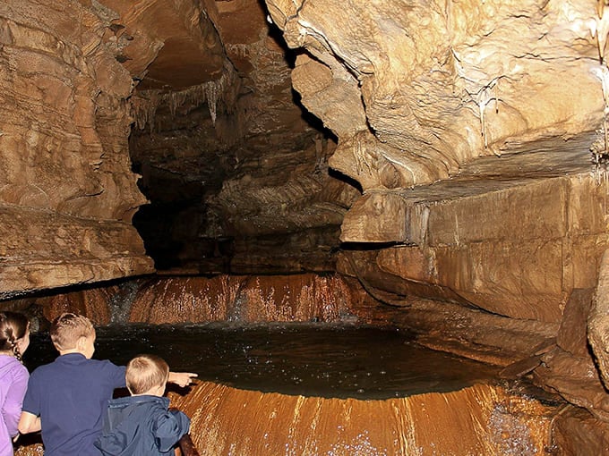 Rimstone pools create natural terraces that look almost too perfect to be real, yet here they are.