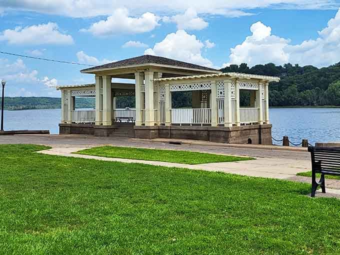 The riverside pavilion offers front-row seats to nature's show, where water meets sky in endless blue perfection.