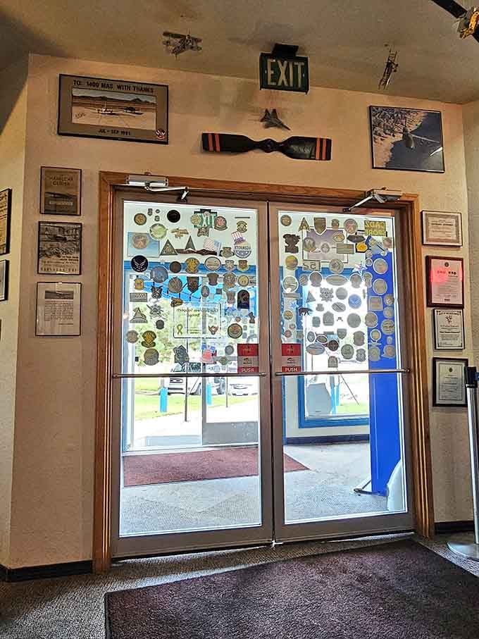 Military patches and memorabilia cover the walls, turning your exit into an impromptu history lesson you'll actually enjoy.