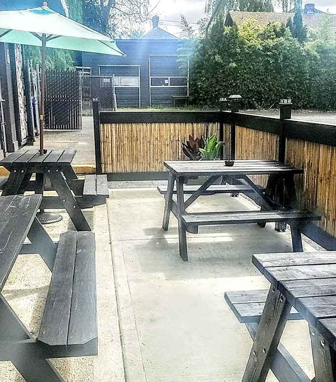 An outdoor patio where you can pretend it's not raining while enjoying your tropical beverage in peace.