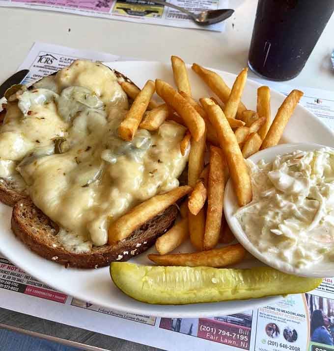 That tuna melt sits on a throne of melted cheese, making every other sandwich look underdressed.