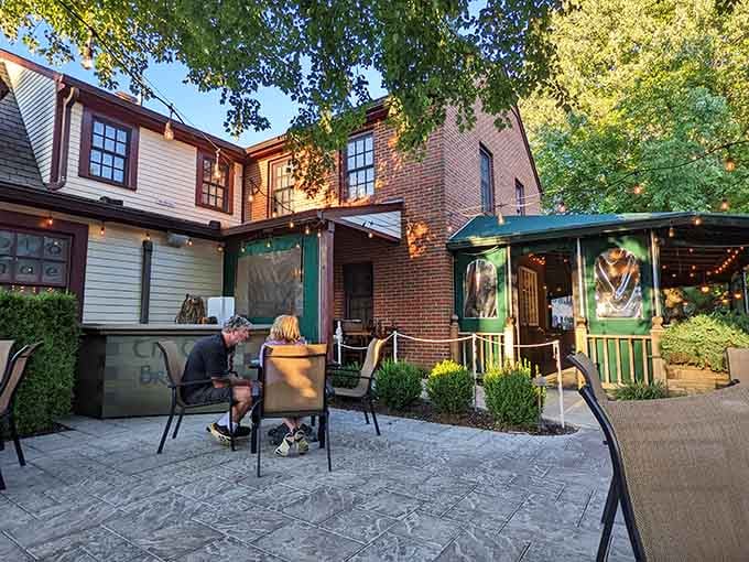 Golden hour lighting transforms the outdoor seating into something Norman Rockwell would have painted between meals.