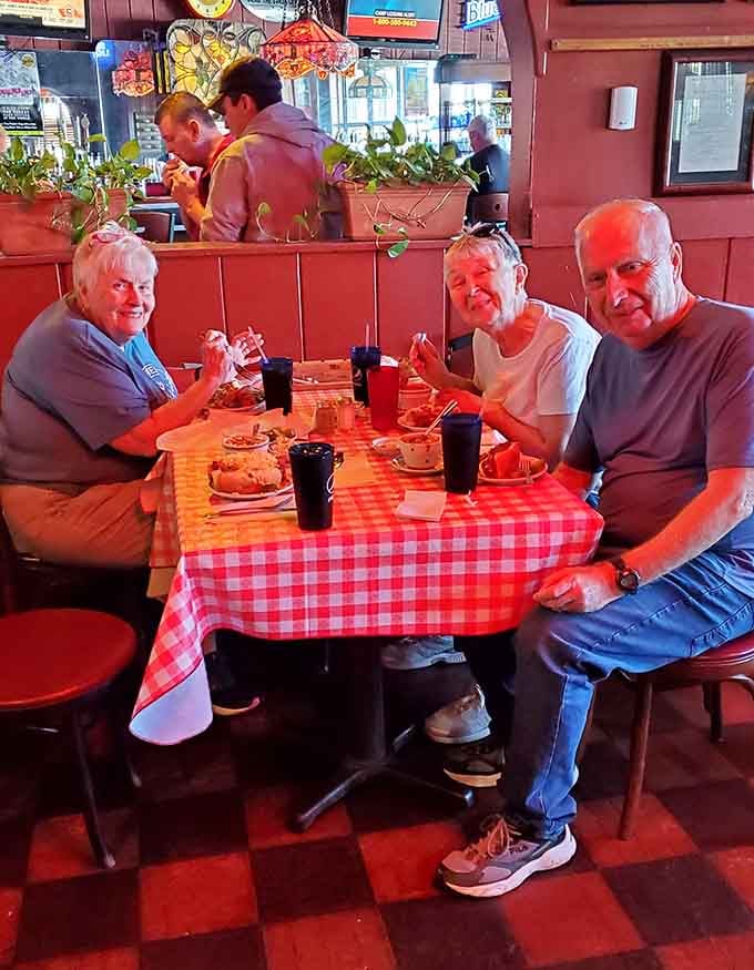 Three generations sharing a meal at those red-checkered tables&mdash;this is what community tastes like, folks.