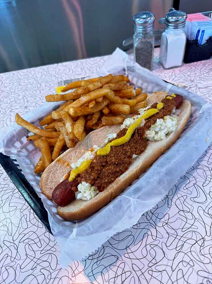 A chili cheese dog with fries: sometimes simple pleasures are the ones that matter most.