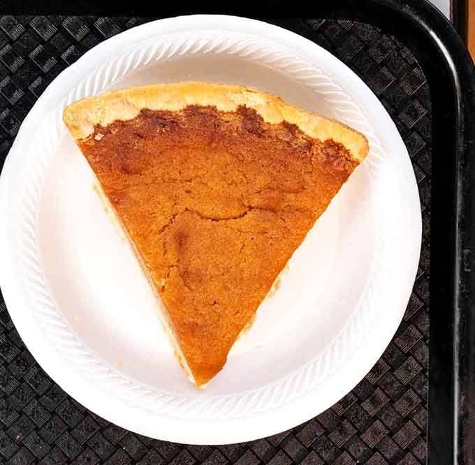 Sweet potato pie so orange and perfect it looks like autumn decided to become dessert and nailed the audition completely.