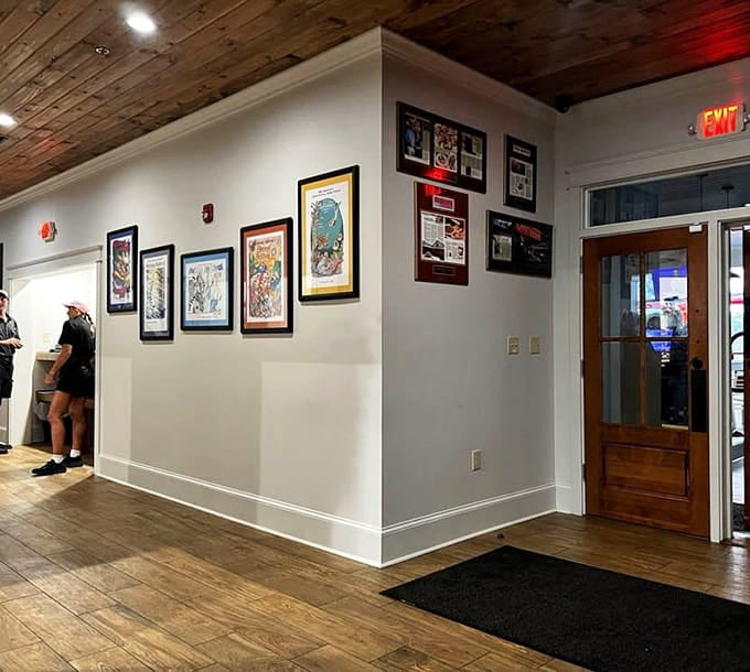 Framed coastal artwork adds character to the walls without trying too hard to be something it's not.