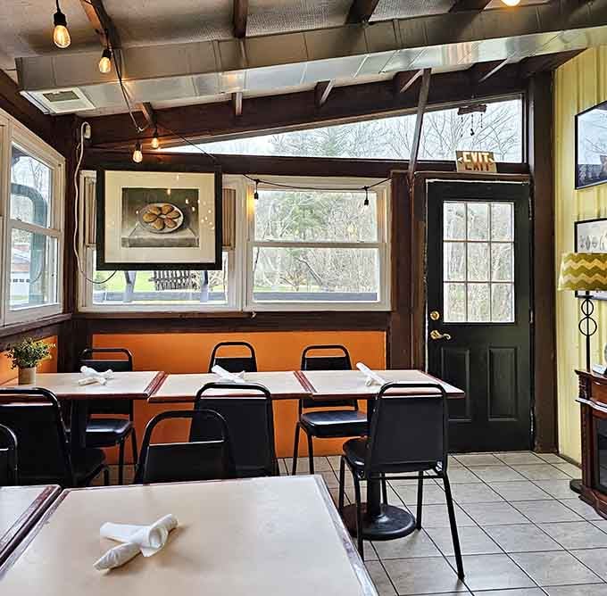 Large windows flood the space with natural light, making every meal feel like a special occasion.