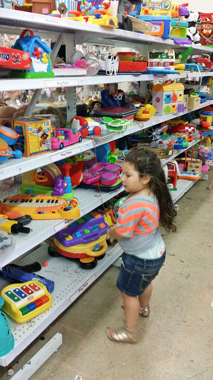 The toy section: where childhood nostalgia meets bargain hunting. One child's discovery becomes tomorrow's cherished plaything.