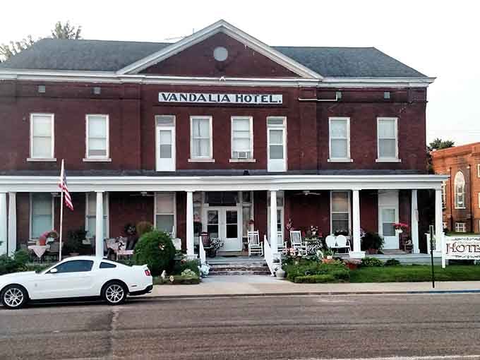Historic Vandalia Hotel standing proud on Main Street, a reminder that hospitality existed long before star ratings and online reviews.