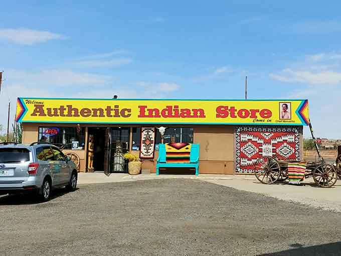 The bright yellow sign and colorful displays promise authentic treasures inside, not the mass-produced souvenirs found at highway rest stops.