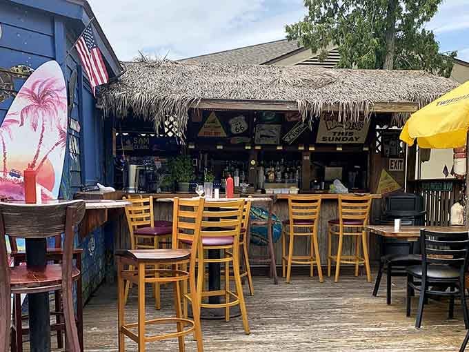 The outdoor bar area where summer evenings and cold drinks create memories you'll actually want to remember.