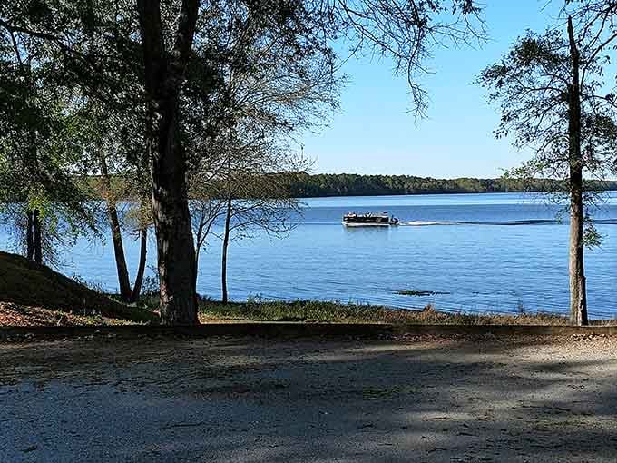 The quintessential "wish you were here" view, where boats drift lazily and time seems to follow their unhurried example.