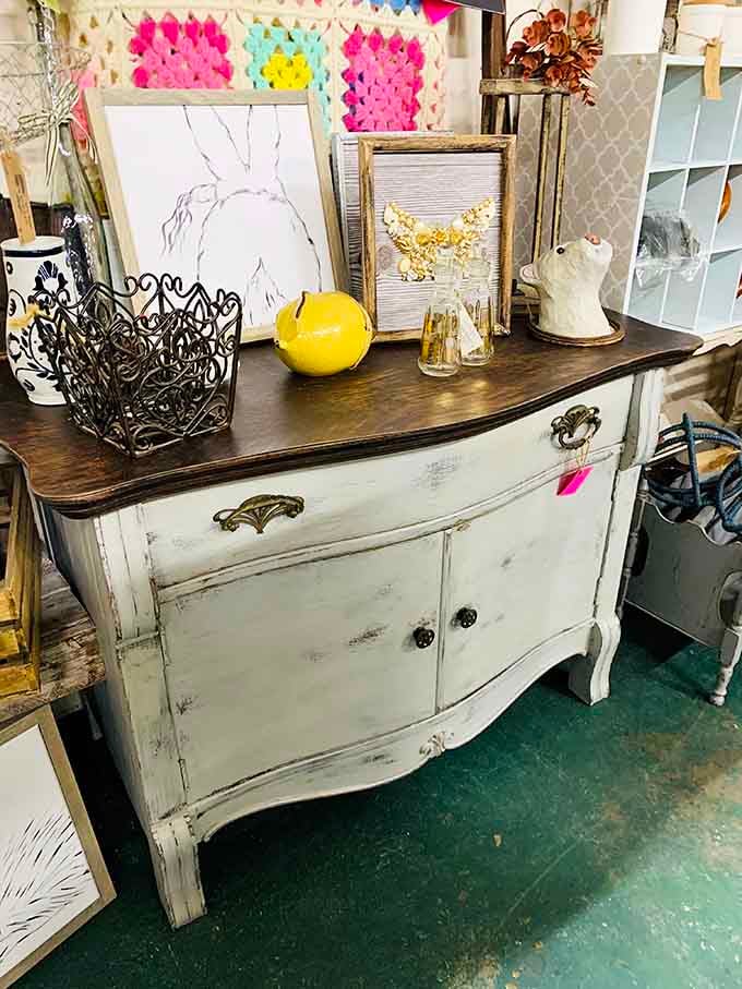 This distressed white cabinet radiates shabby-chic charm that interior designers charge thousands to replicate, but here it's refreshingly affordable.