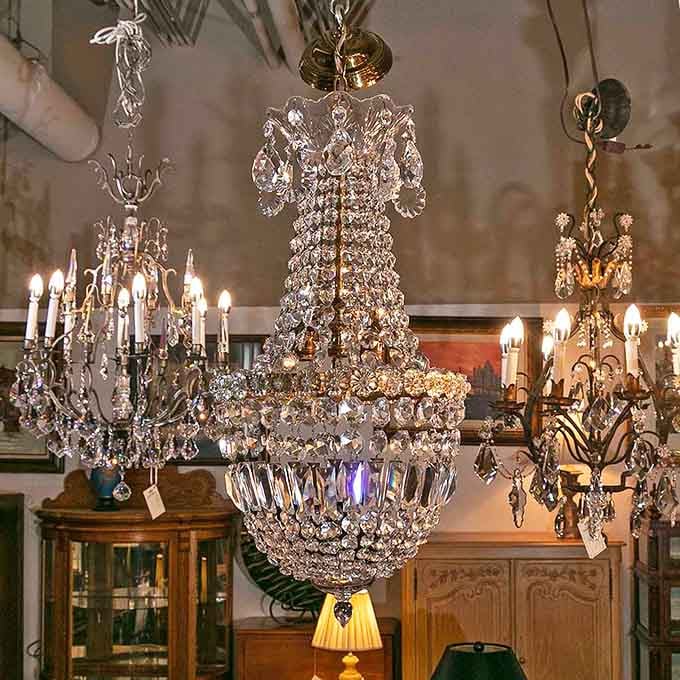 Crystal chandeliers that have likely illuminated more interesting conversations than most of us have had in a lifetime. Instant glamour, no palace required.