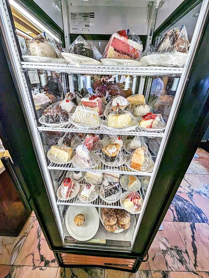 The dessert case&mdash;where willpower goes to die. Each slice of cake is practically its own zip code!