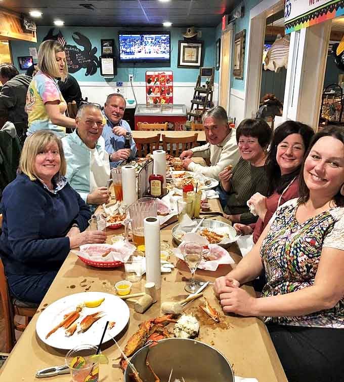 The true measure of a great seafood joint: tables full of happy diners with paper bibs, mallets in hand, and expressions of pure seafood bliss.