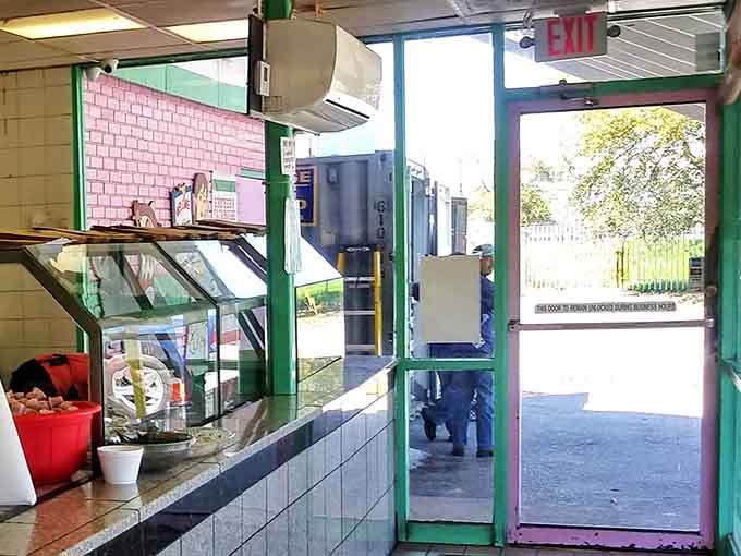 The kitchen view reveals the heart of the operation – where tortilla magic happens before your eyes on a well-seasoned flat-top grill.