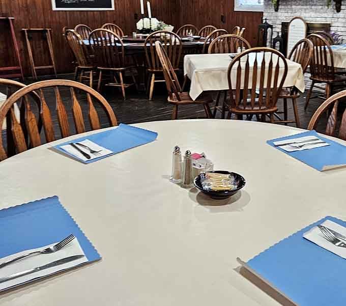 Tables set with care in a room where countless celebrations and everyday moments have unfolded over decades of pie-centered gatherings.