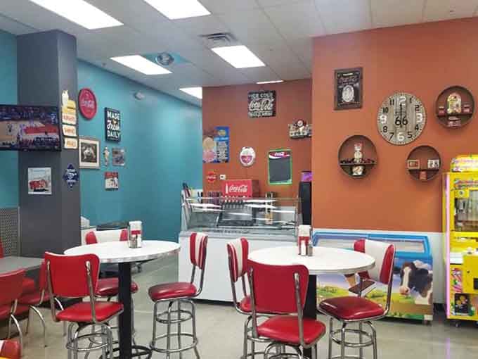 The diner's color palette—turquoise walls, cherry-red chairs—creates the perfect backdrop for both hearty meals and heartfelt conversations.