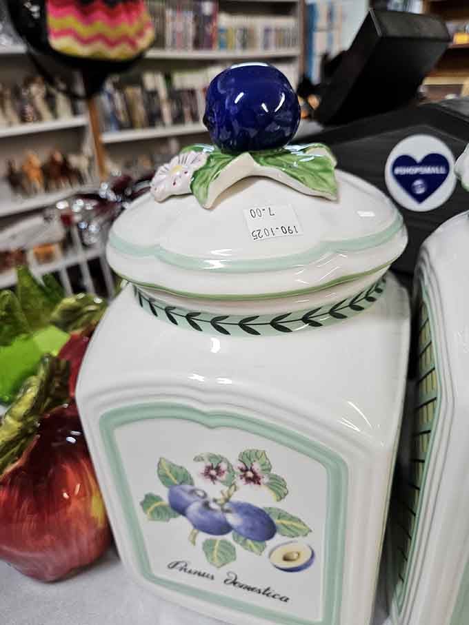 That vintage fruit-adorned canister isn't just kitchen storage&mdash;it's a portal to grandma's house where cookies were always fresh-baked.