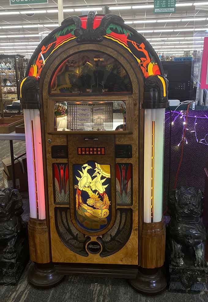 This magnificent jukebox isn't just furniture—it's a time machine. One look and you can practically hear Buddy Holly crooning through those illuminated panels.