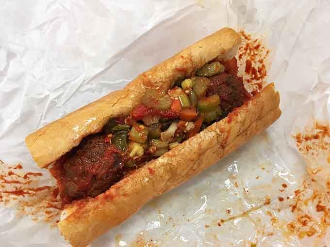 A proper Italian meatball sandwich should require multiple napkins and possibly a nap afterward. This beauty checks all the boxes and then some.