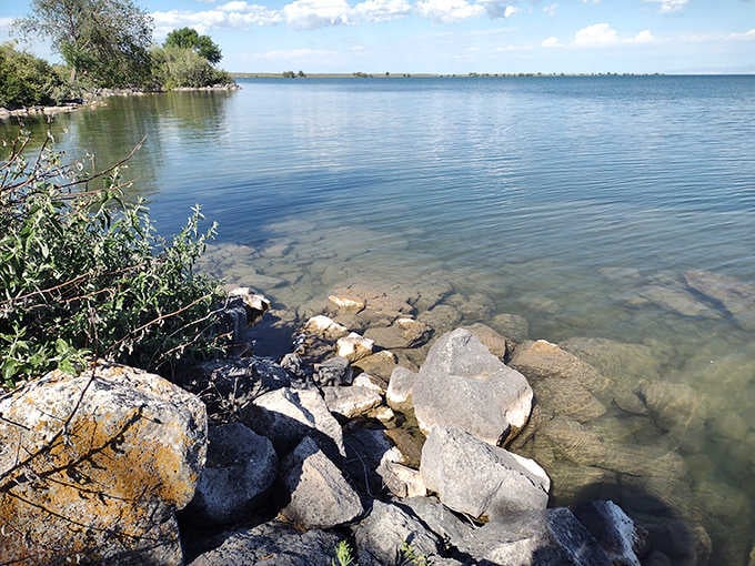Crystal clear waters reveal Lake Walcott's rocky shoreline&mdash;nature's aquarium where every view is front-row seating.