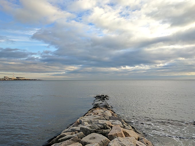 Stone jetties stretch into the Sound like nature's own breakwater art installation, creating calm waters perfect for contemplation.
