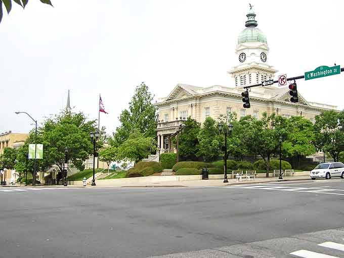 The courthouse sits regally on its hill, watching over a community where neighbors still wave to strangers.