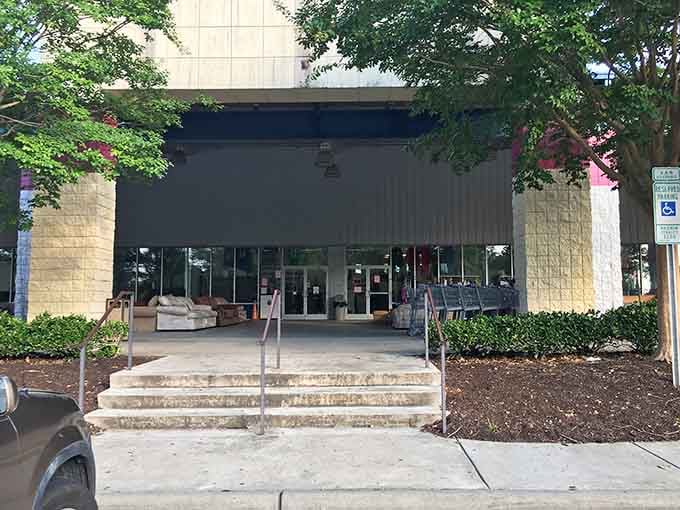 Shaded by mature trees, this welcoming entrance invites you to discover treasures while supporting a worthy cause.