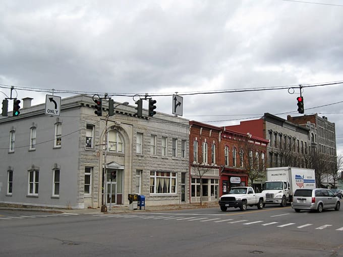 Stone and brick buildings stand shoulder to shoulder, weathering storms together like they have for over a century now.